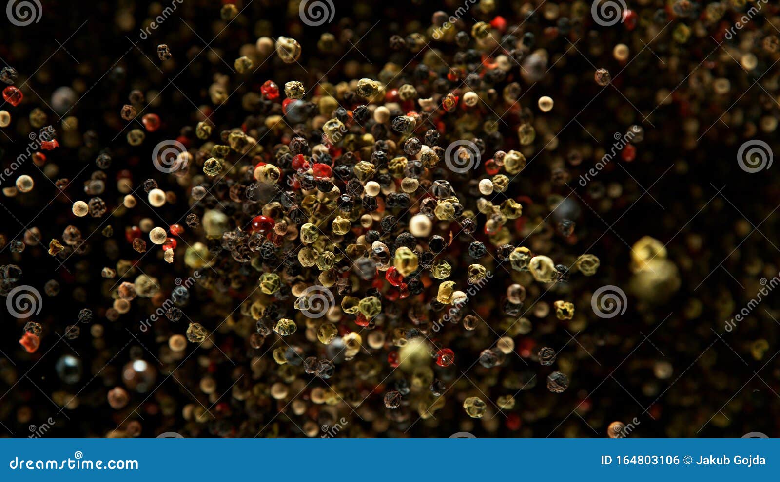 Whole Coloured Pepper Spice Flying in the Air Stock Photo - Image of ...