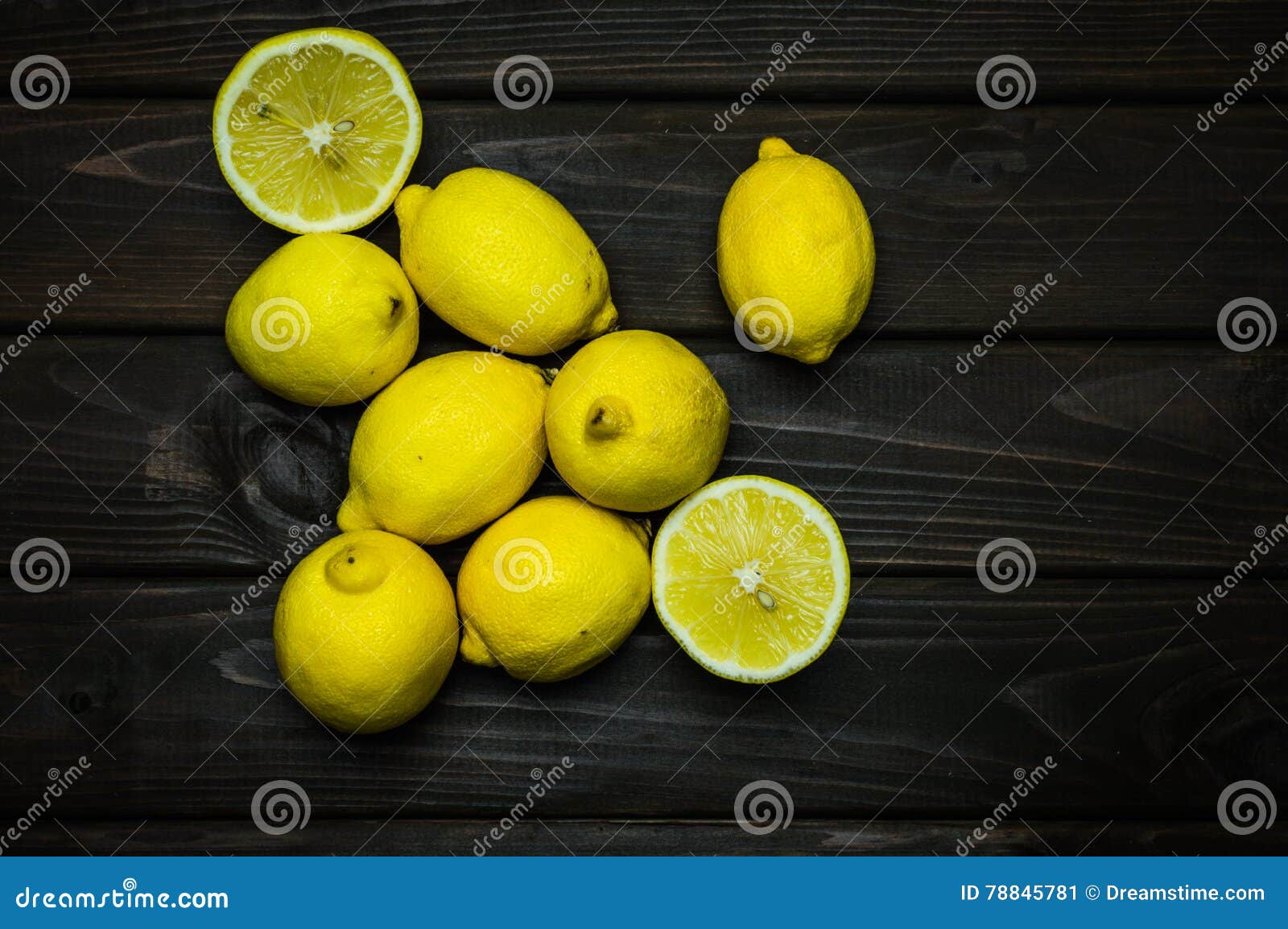 Whole and Cut Lemons on Grey Wooden Surface Stock Image - Image of grey ...