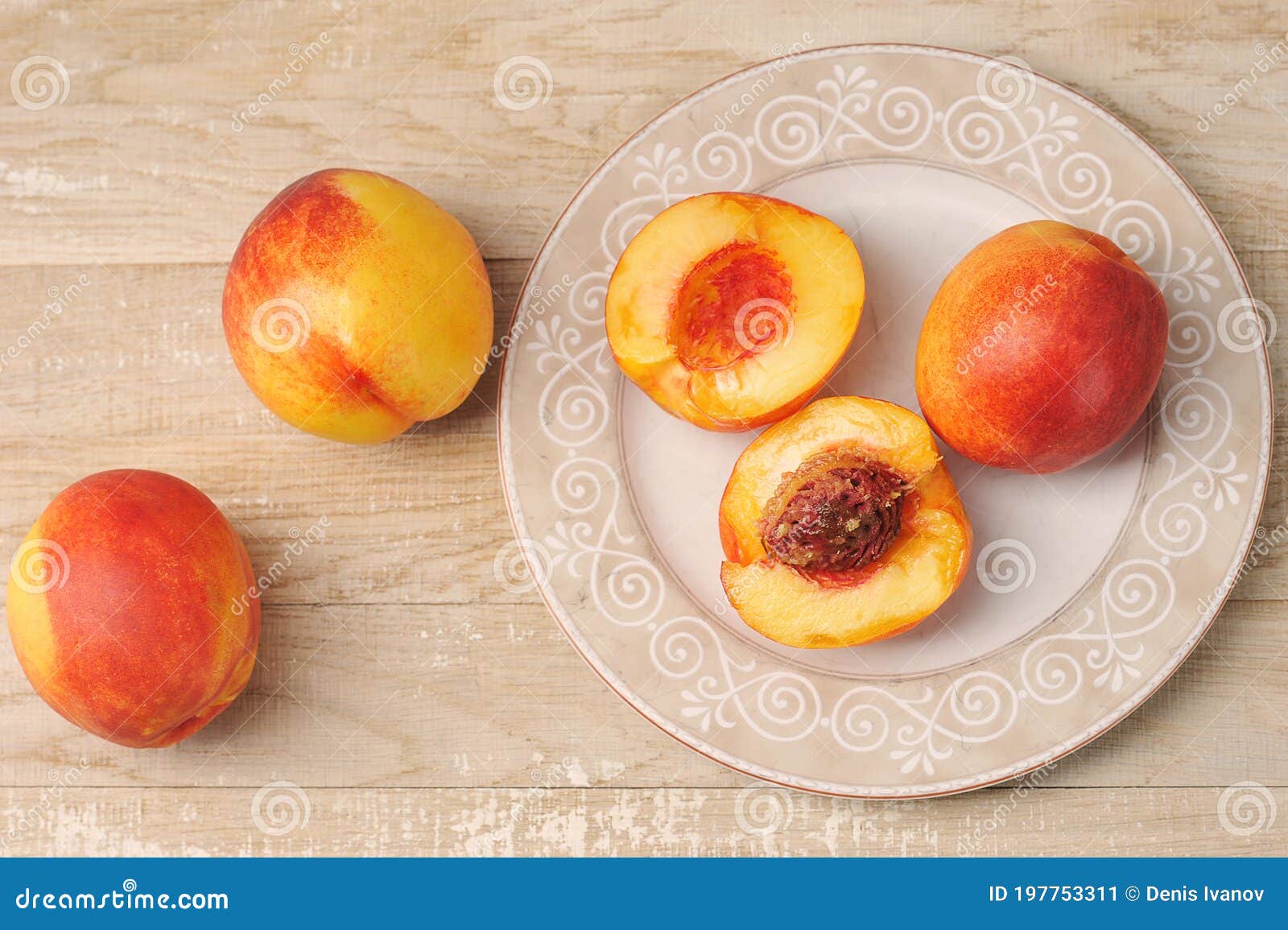 Whole and Cut Nectarine on a Plate Stock Image - Image of yellow ...
