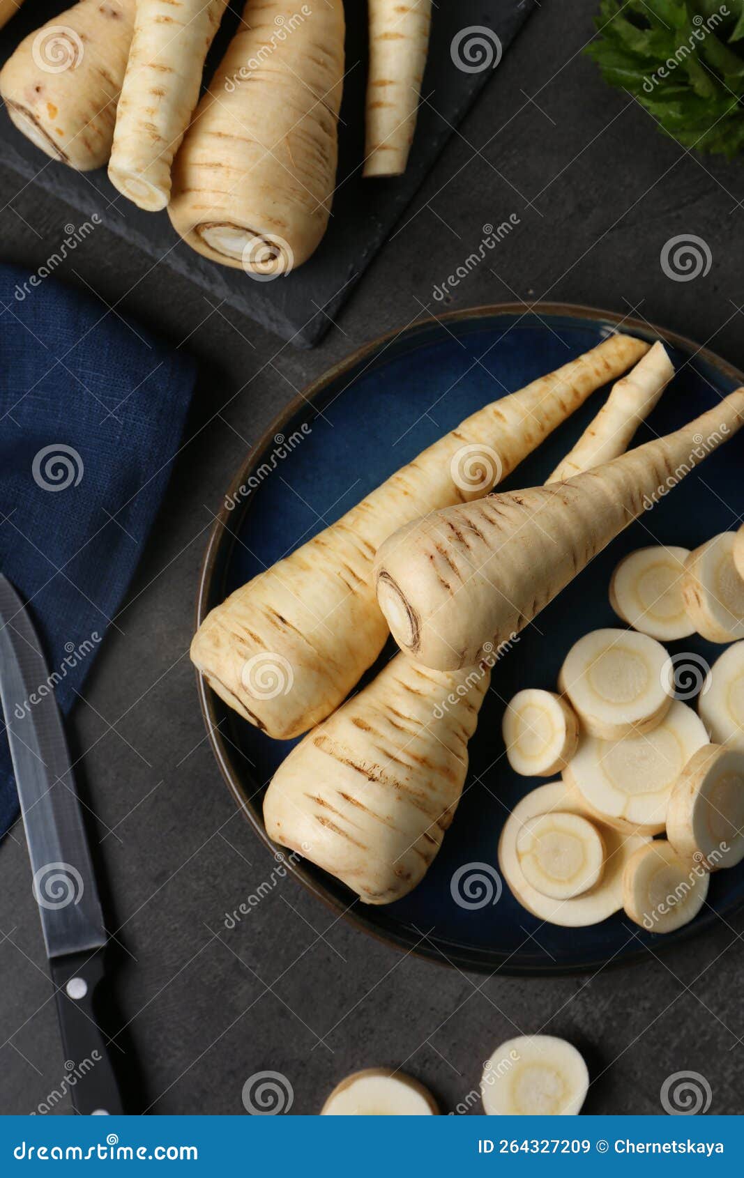 Whole and Cut Parsnips on Black Table, Flat Lay Stock Image - Image of ...