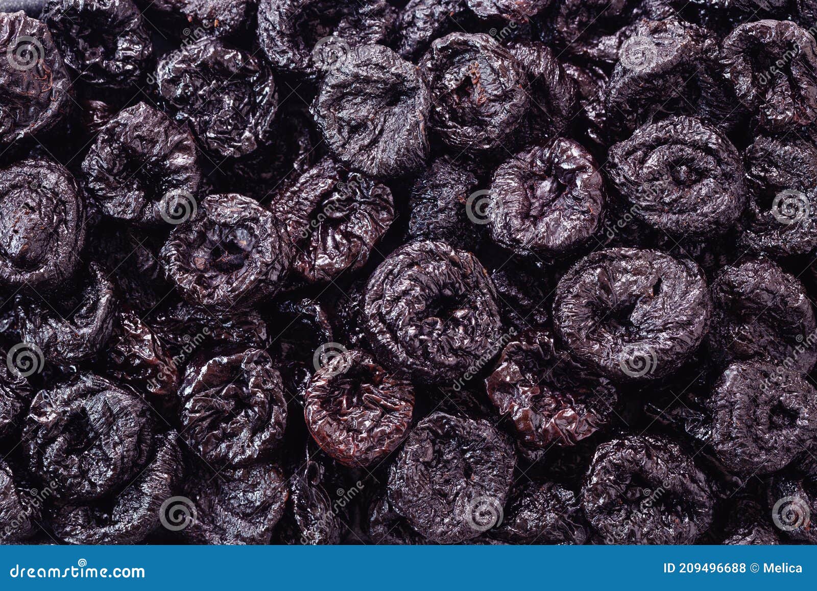 Whole dried plums, pitted stock photo. Image of black - 209496688