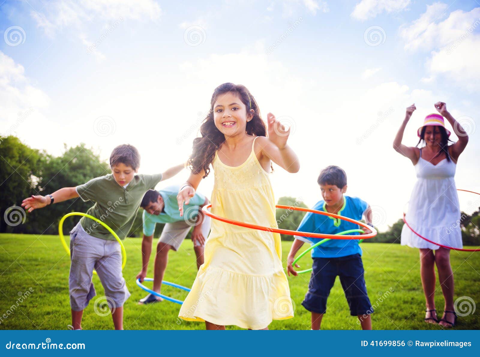 Whole Family Hula Hooping Outdoors Stock Photo - Image of fitness ...