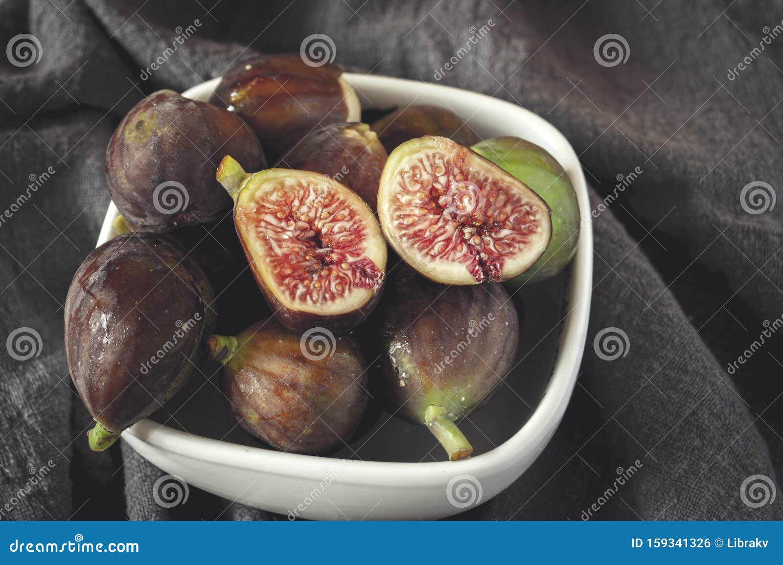 Whole Figs and One Fig Sliced in Half Stock Photo - Image of breakfast ...