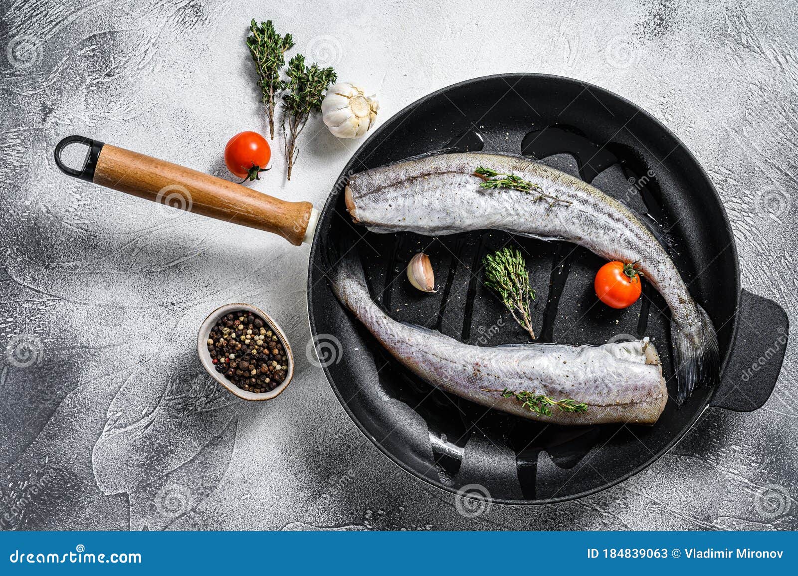 Whole Fish Pollock in a Pan. Raw Seafood. White Background Stock Image ...