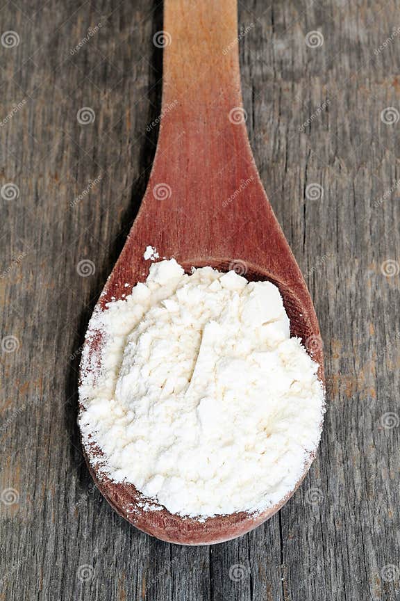 Whole flour in spoon stock photo. Image of kitchen, grain - 28787552