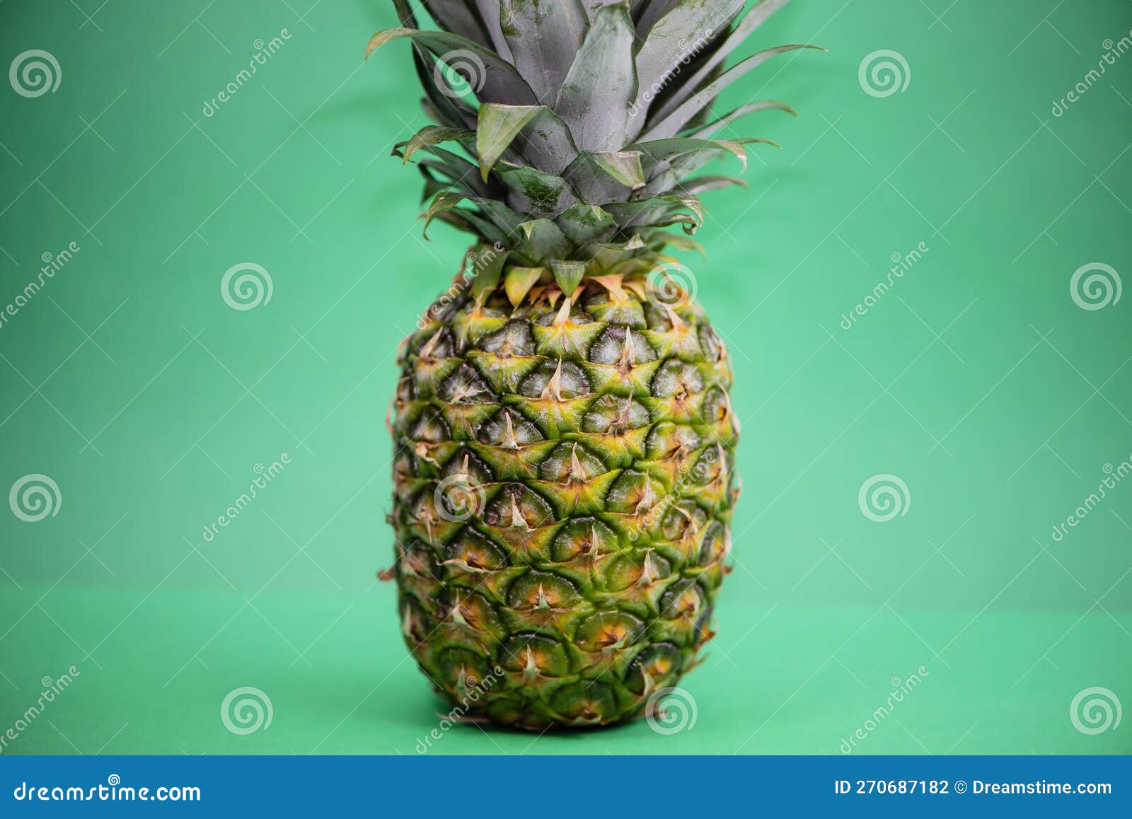 Whole Fresh Pineapple with Leaves on Green Stock Photo - Image of ...