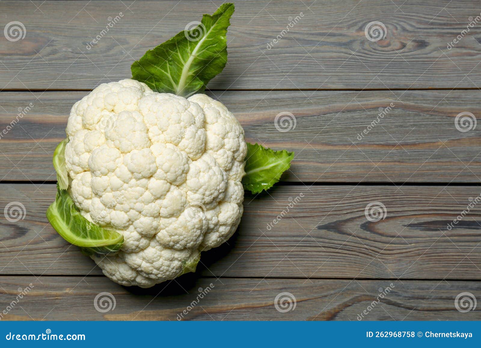 Whole Fresh Raw Cauliflower on Wooden Table, Top View. Space for Text ...