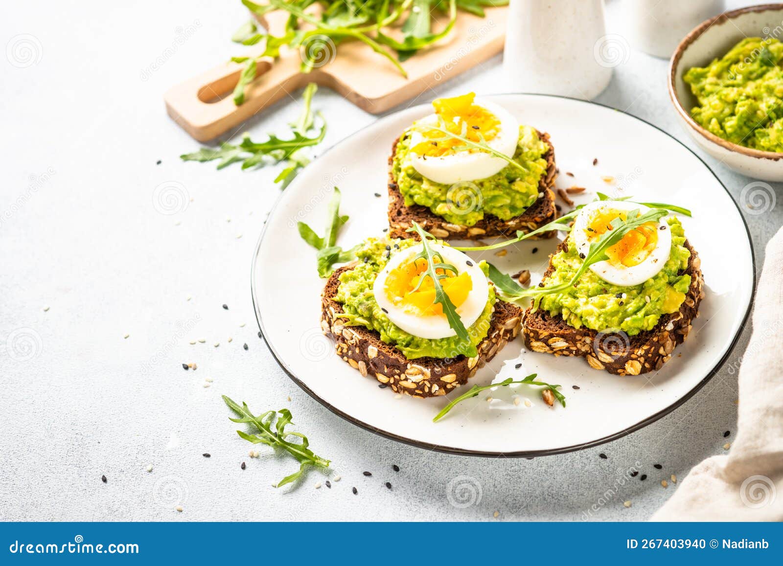 Whole Grain Bread with Avocado and Boiled Eggs. Stock Photo - Image of ...