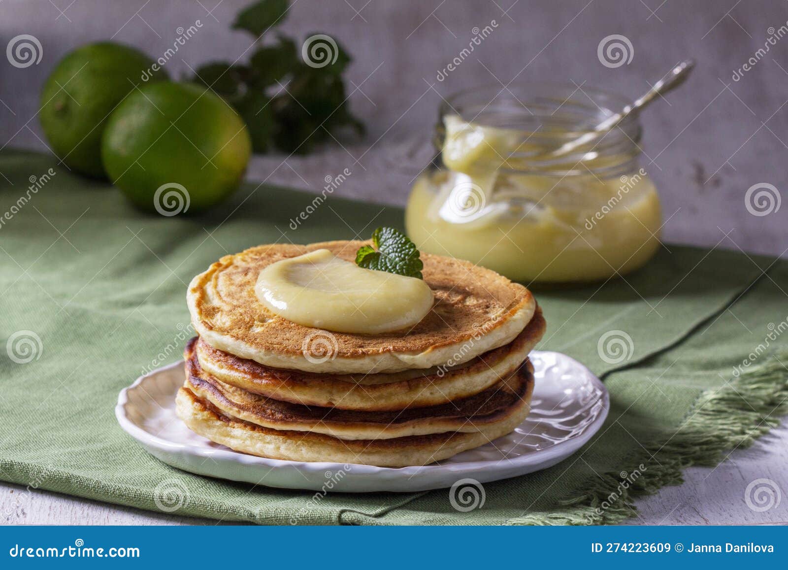 Whole Grain Flour Fritters Served with Lime Curd on a Light Background ...