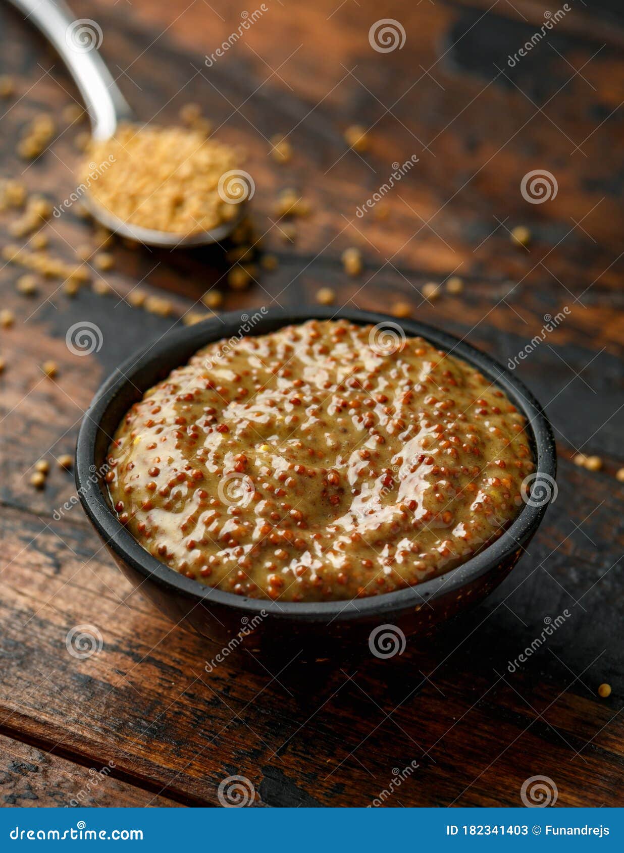 Whole Grain Mustard in Bowl on Wooden Table. Stock Image - Image of ...