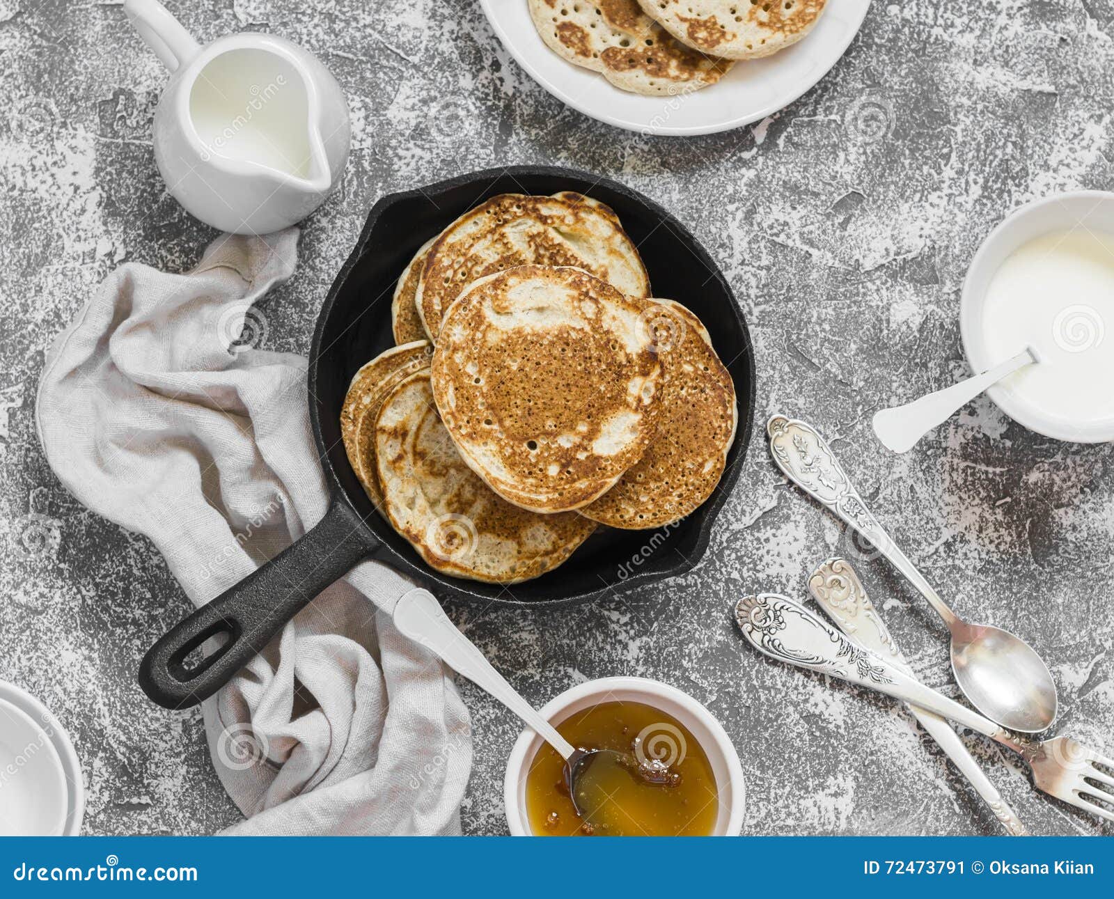 Whole Grain Pancakes in a Cast Iron Pan on a Stone Background. Stock ...