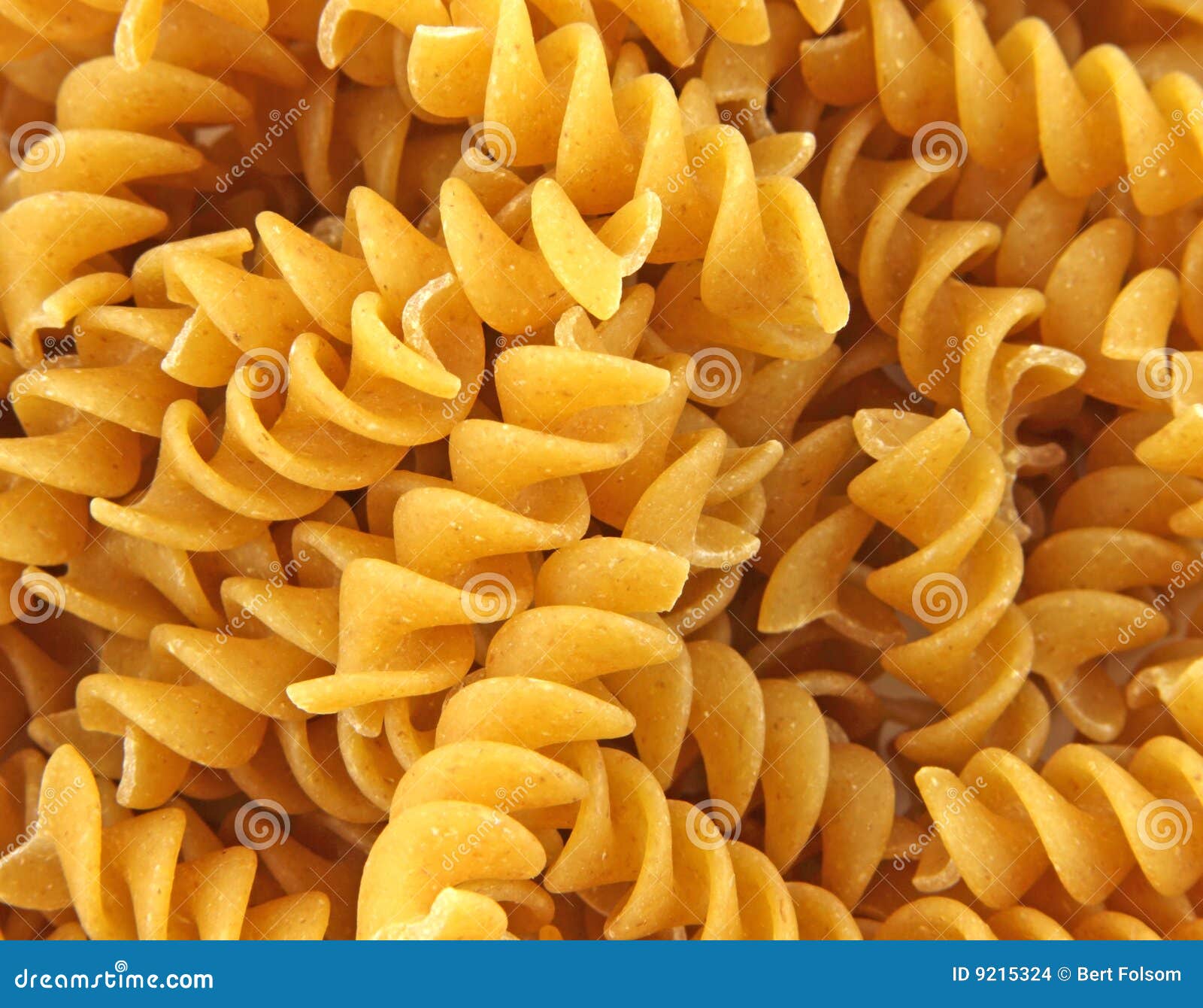 Whole grain Rotini pasta stock photo. Image of yellow - 9215324