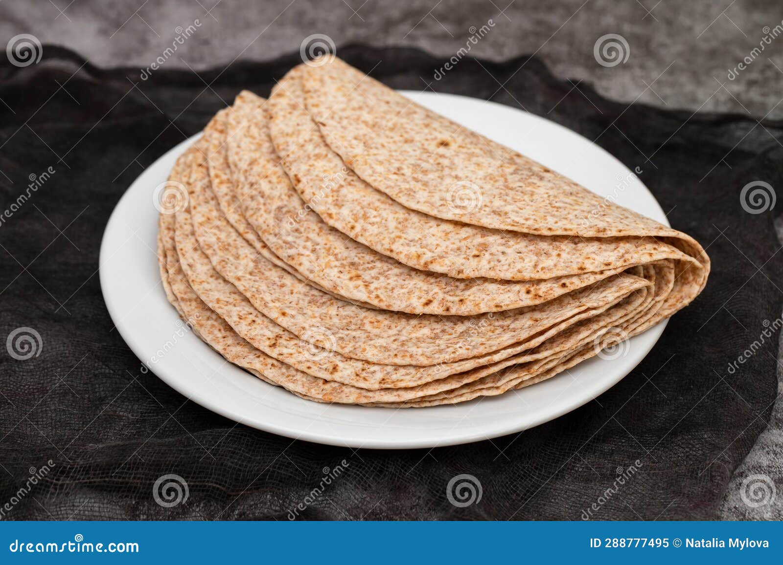 Whole Grain Tortilla Wraps on White Plate Stock Image - Image of food ...