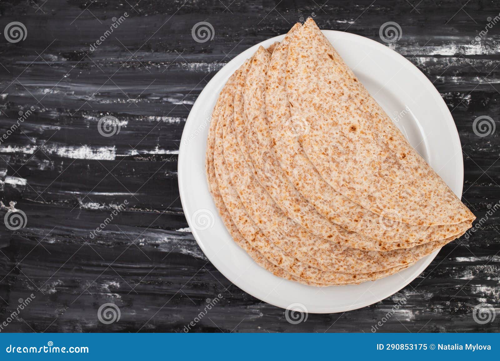 Whole Grain Tortilla Wraps on White Plate Stock Image - Image of ...