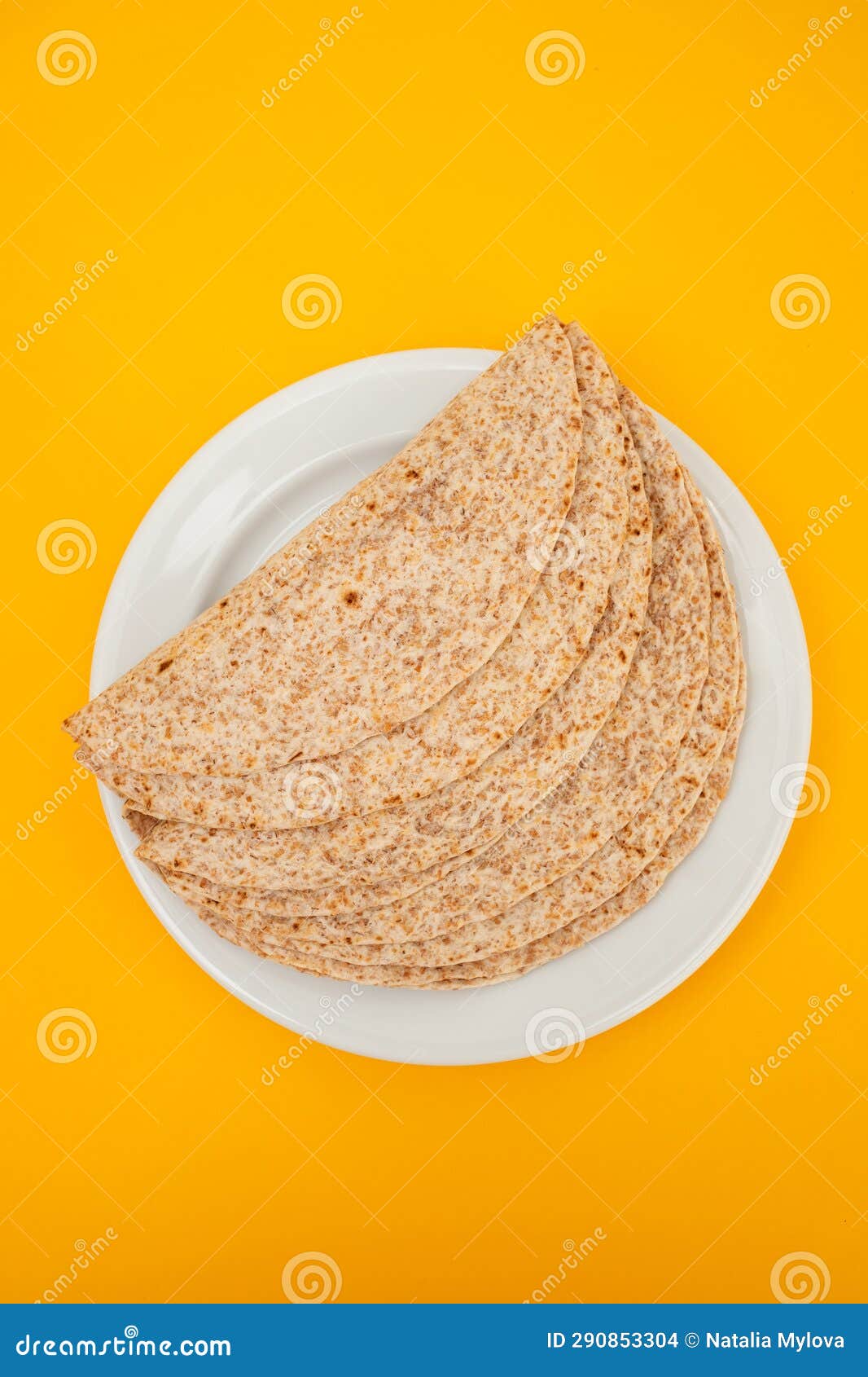Whole Grain Tortilla Wraps on White Plate Stock Photo - Image of tasty ...
