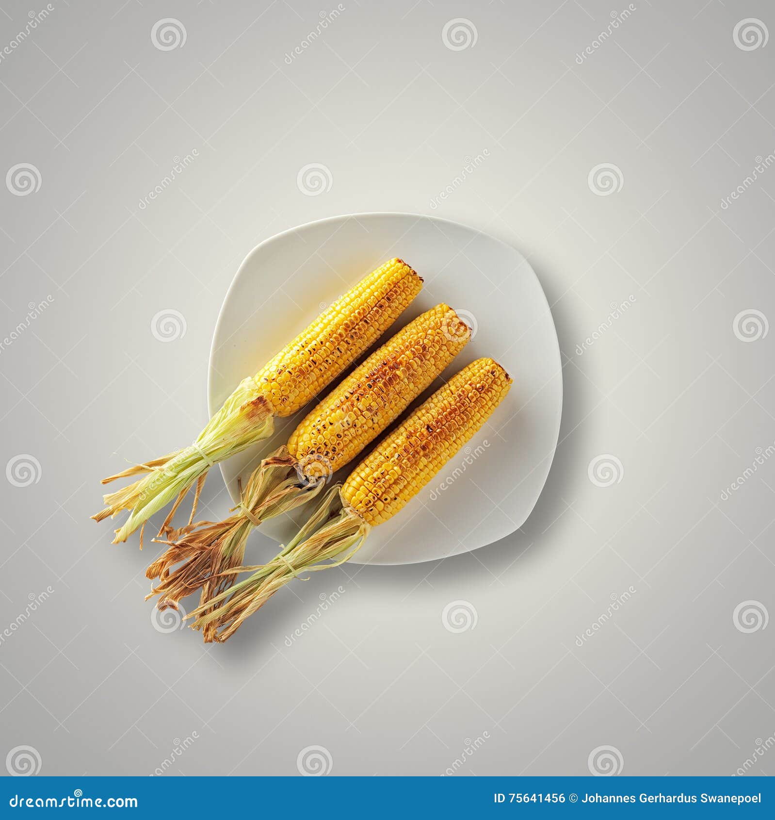 Whole Grilled Corn on a Plate Stock Photo - Image of grilled, vegetable ...