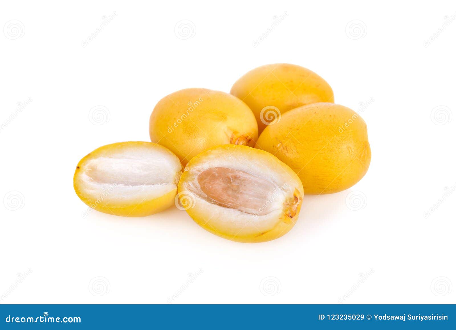 Whole and Half Cut Fresh Yellow Dates on White Background Stock Image ...