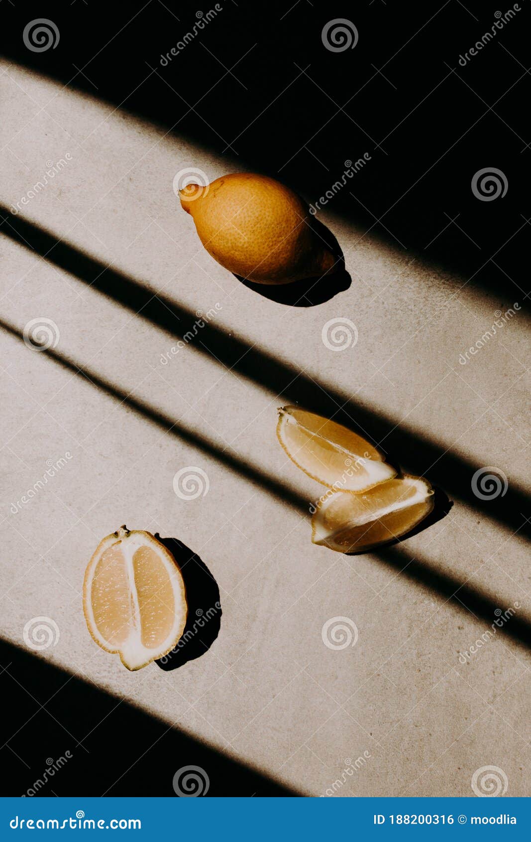 A Whole, a Half and Two Quarters of Lemon Stock Photo - Image of ...