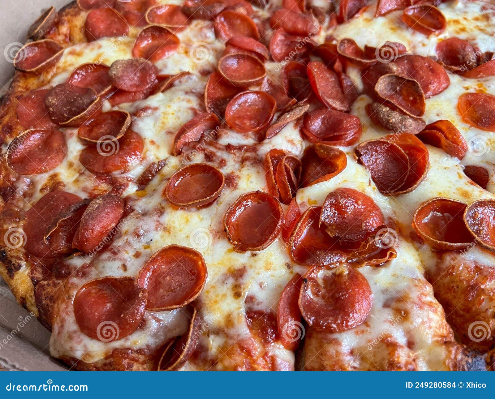 A Whole Large Pepperoni Pizza with Mini Pepperonis Stock Photo - Image ...