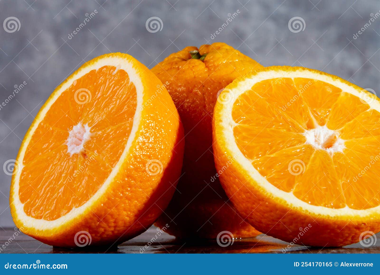 Whole Orange and Cut Half. Orange Fruit on Concrete Texture Background ...