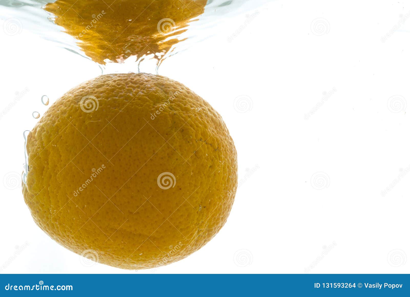 A Whole Orange Thrown into the Water. View from Under the Water Stock ...