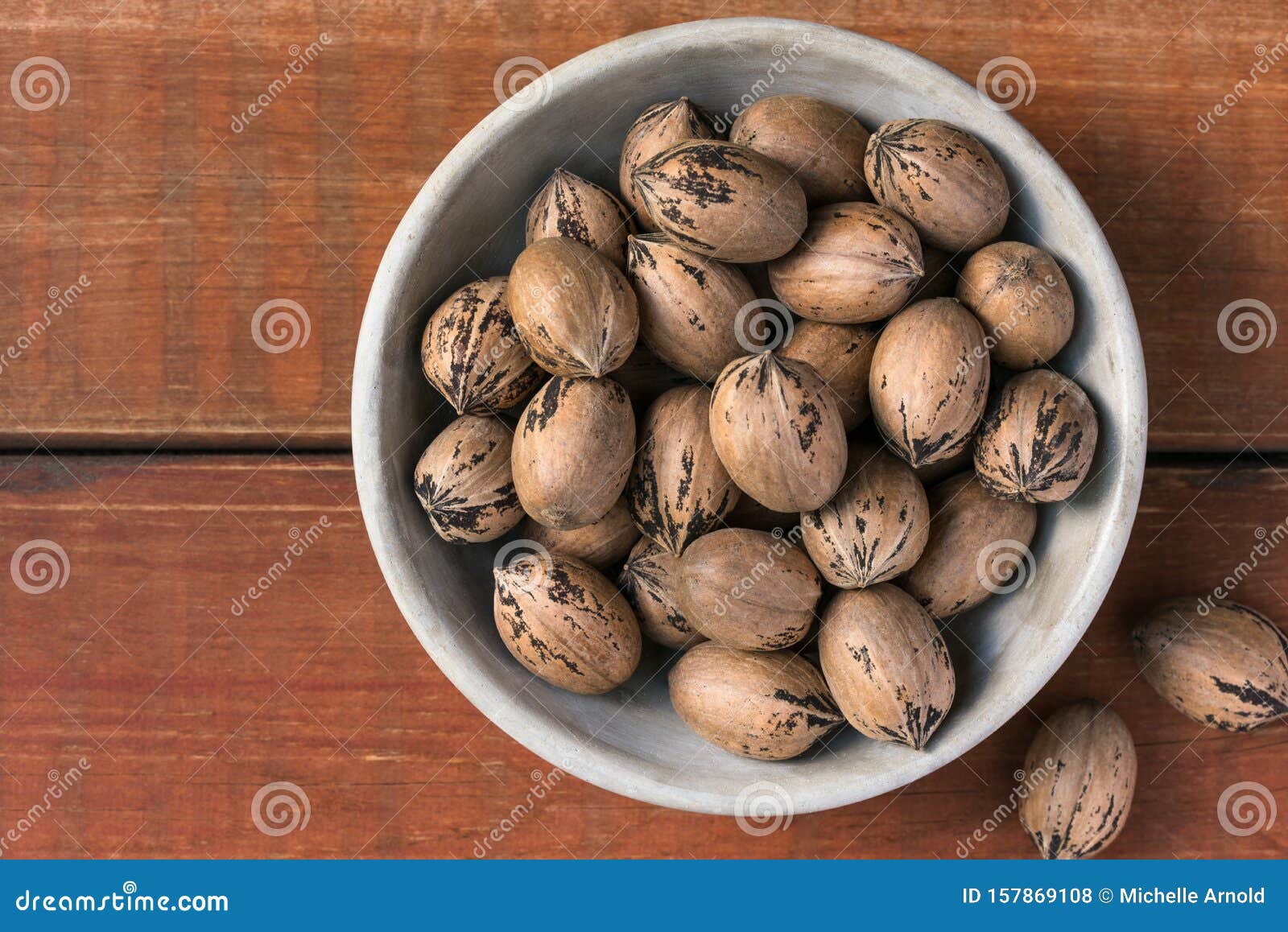Whole Pecans in a Bowl stock photo. Image of copy, view - 157869108