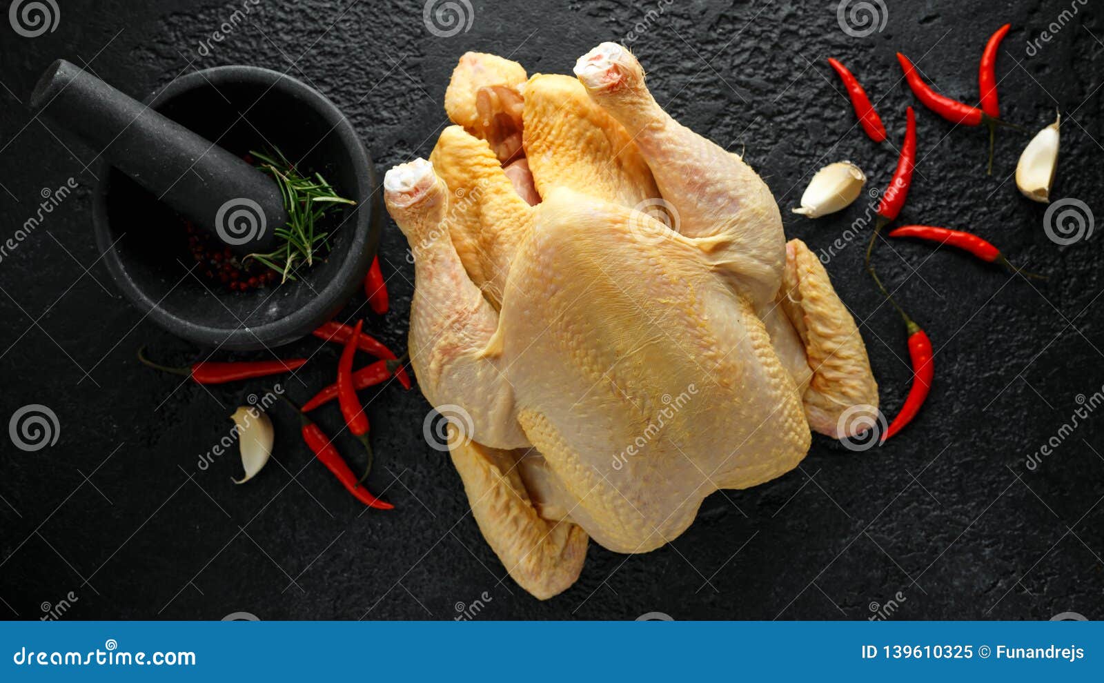 Whole Raw Chicken with Seasonings in Granite Mortar Stock Image - Image ...