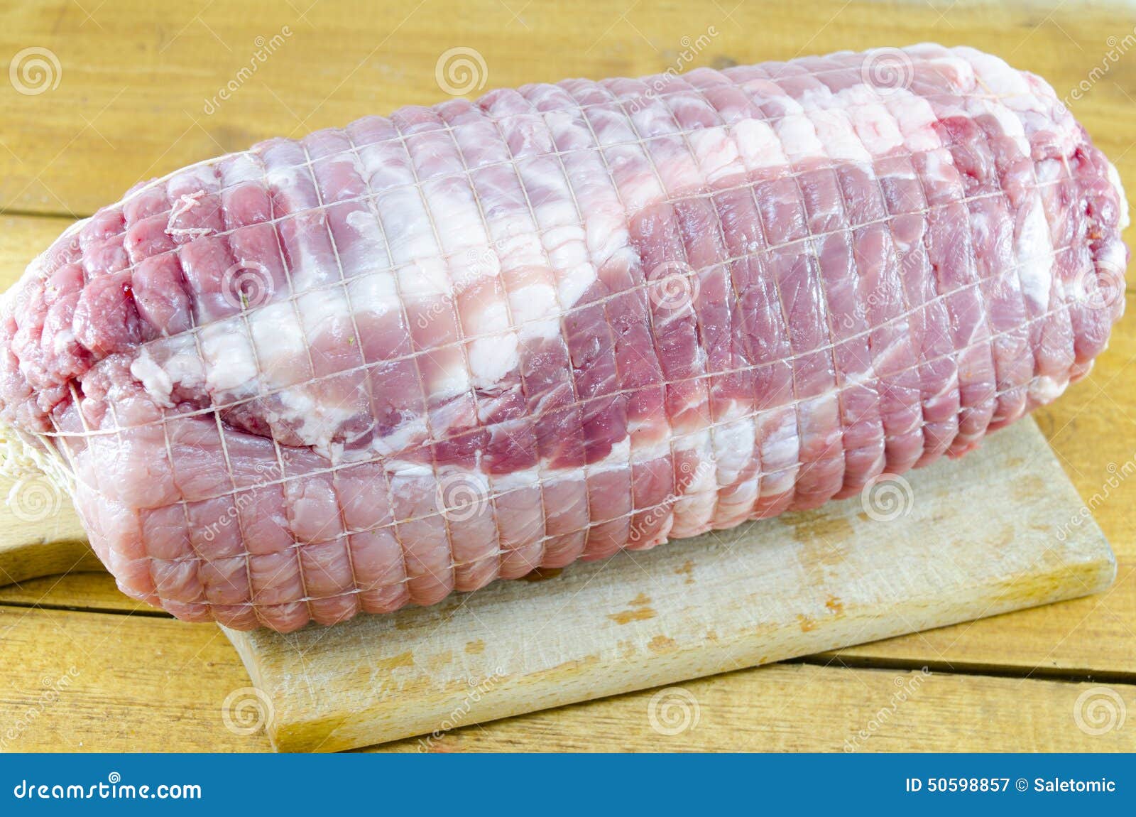 Whole Raw Meatloaf on a Cutting Board Stock Image - Image of wooden ...