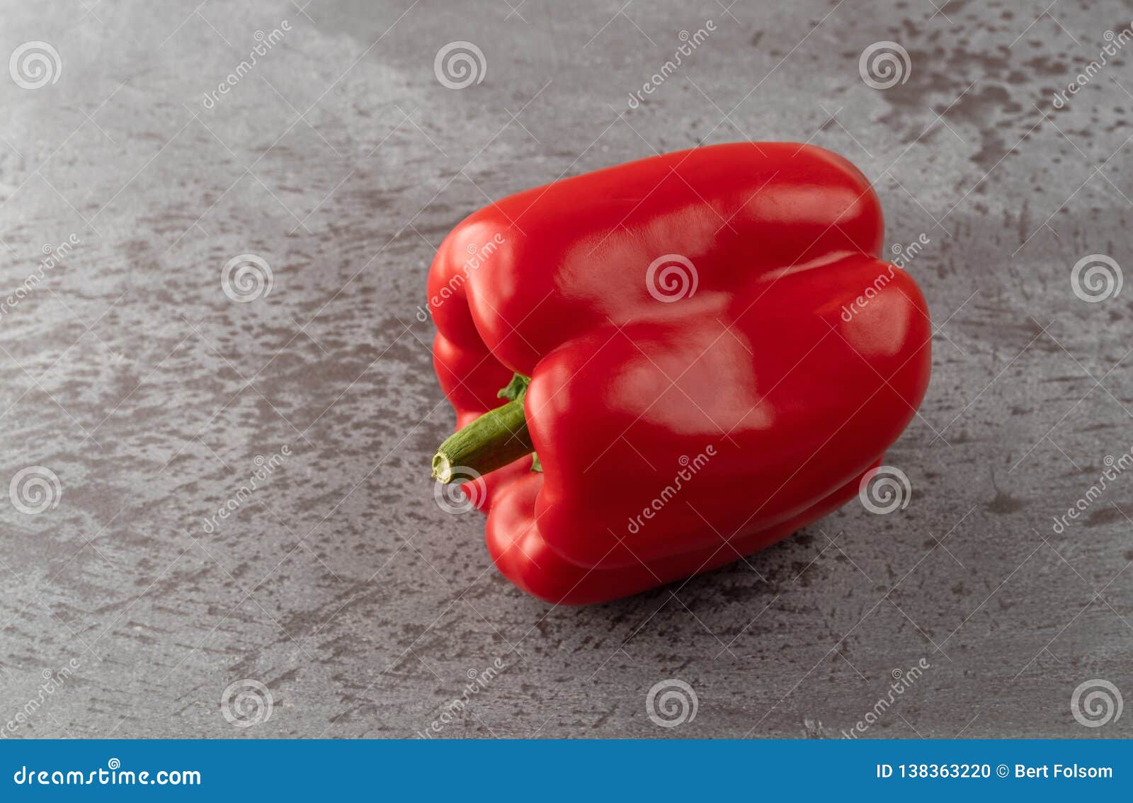 Whole Red Bell Pepper on a Gray Counter Top Stock Photo - Image of ...