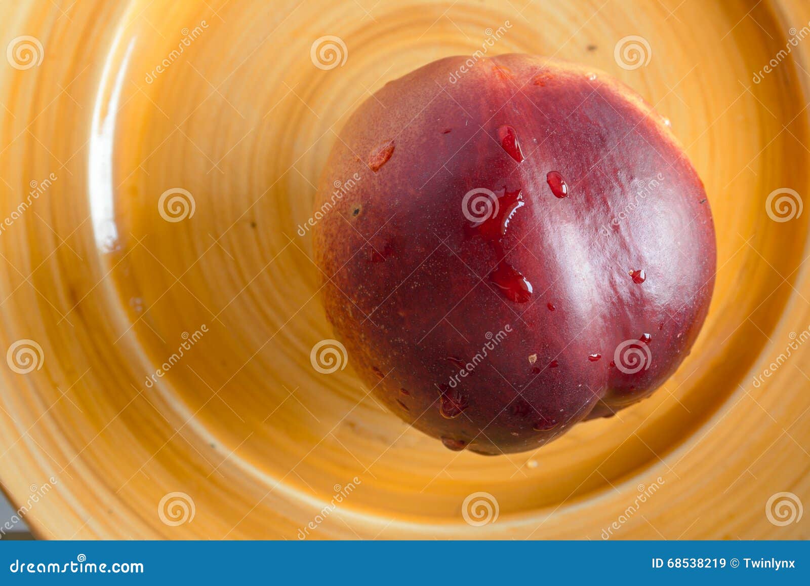The Whole Red-orange Peach on a Yellow Plate Stock Image - Image of ...