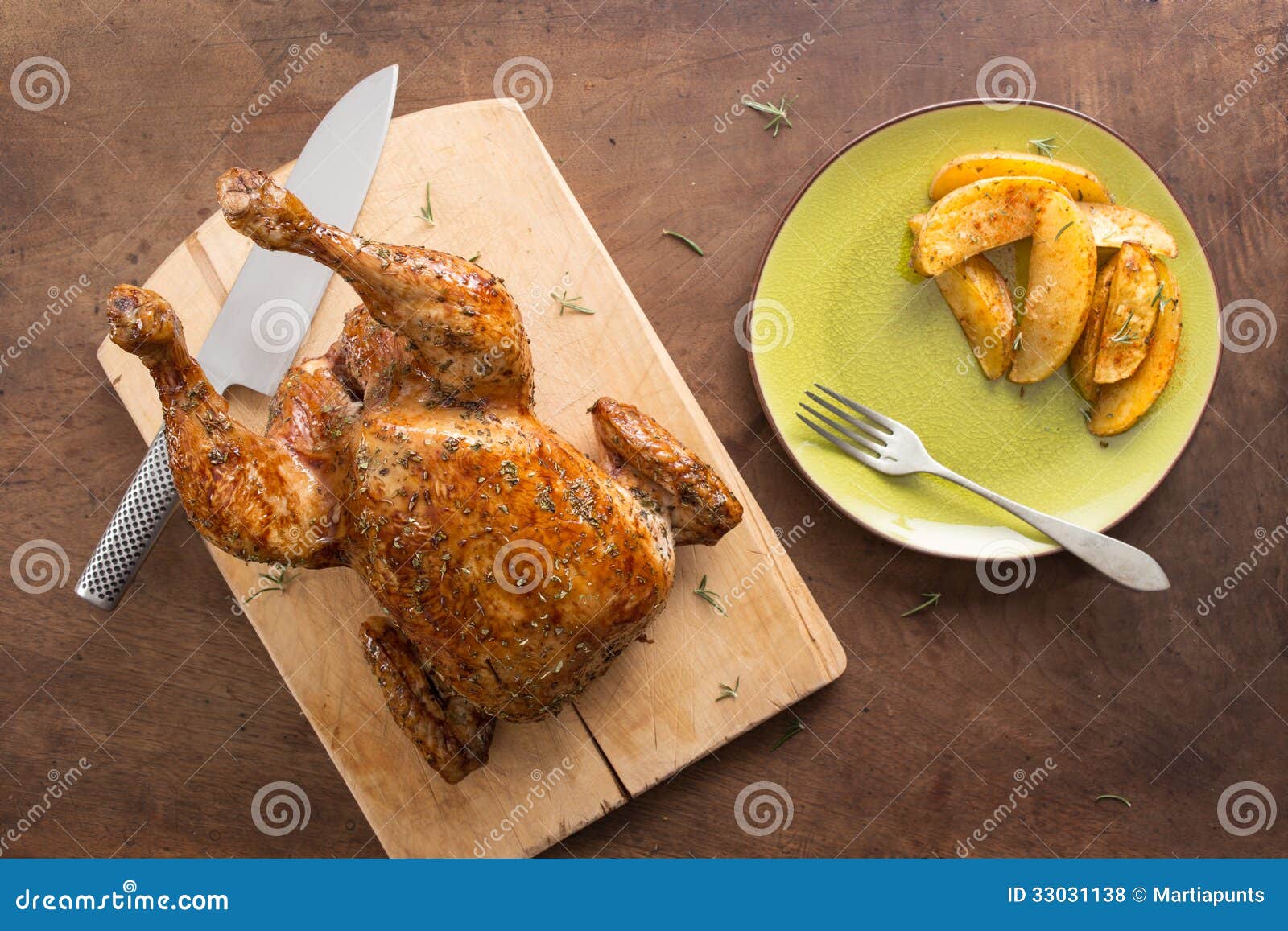 Whole Roast Chicken on Wooden Table Stock Photo - Image of grilled ...