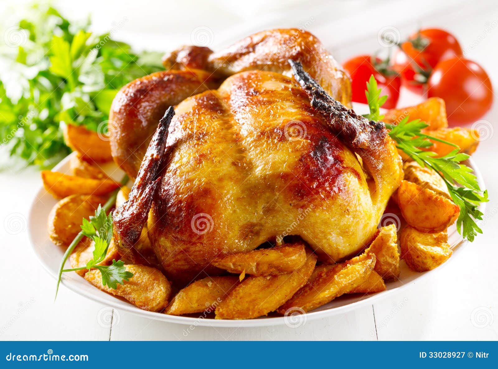 Whole roasted chicken stock image. Image of plate, tomato - 33028927
