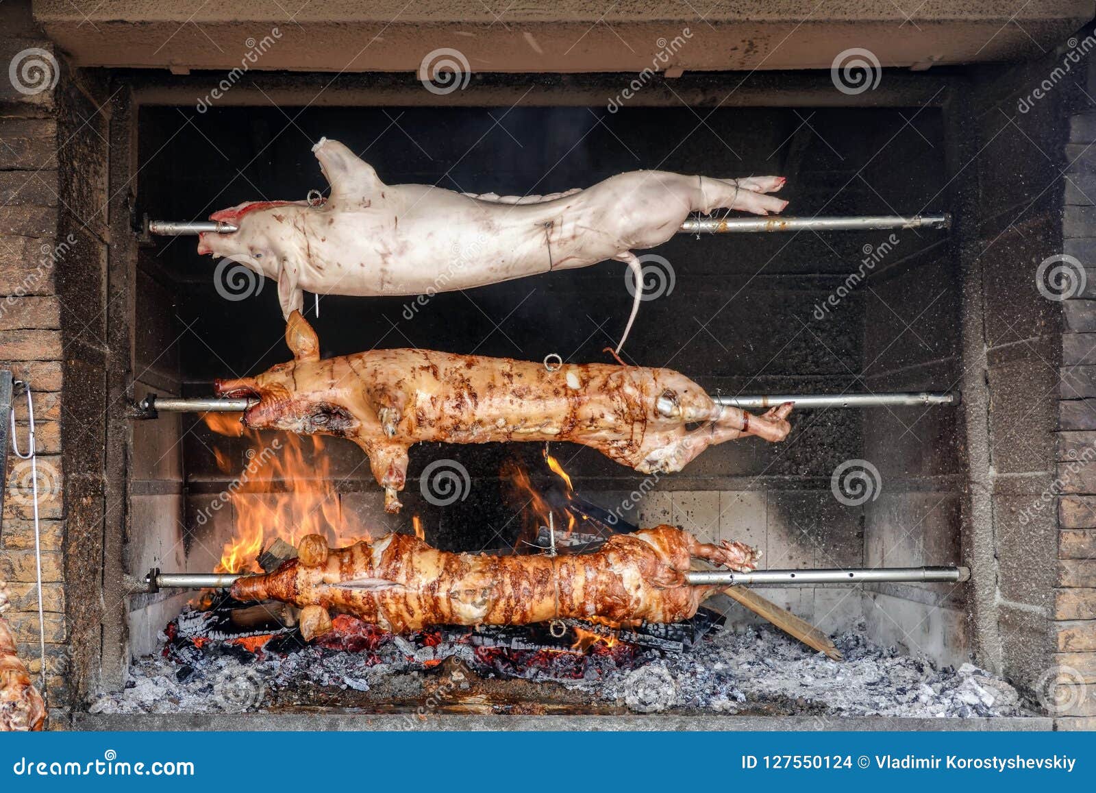 Whole Roasted Pigs on the Rack Stock Photo - Image of grill, cook ...