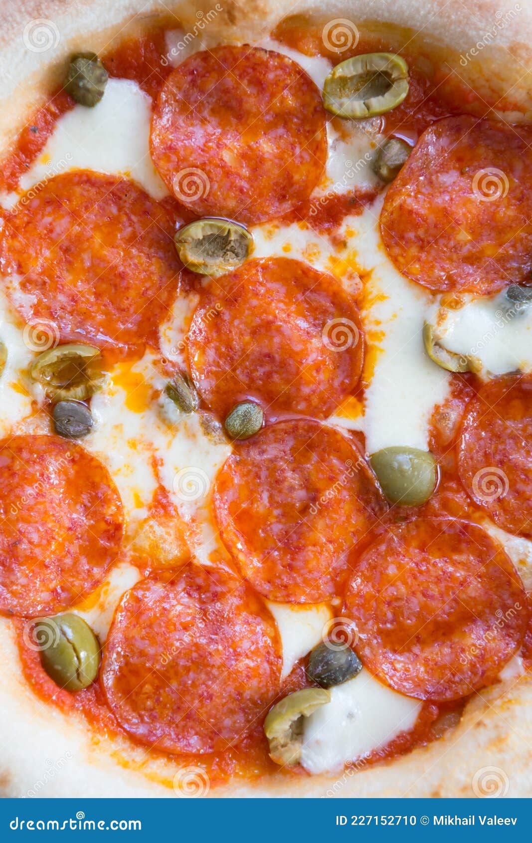 Whole Round Neapolitan Pepperoni Pizza Served on a Table Stock Photo ...