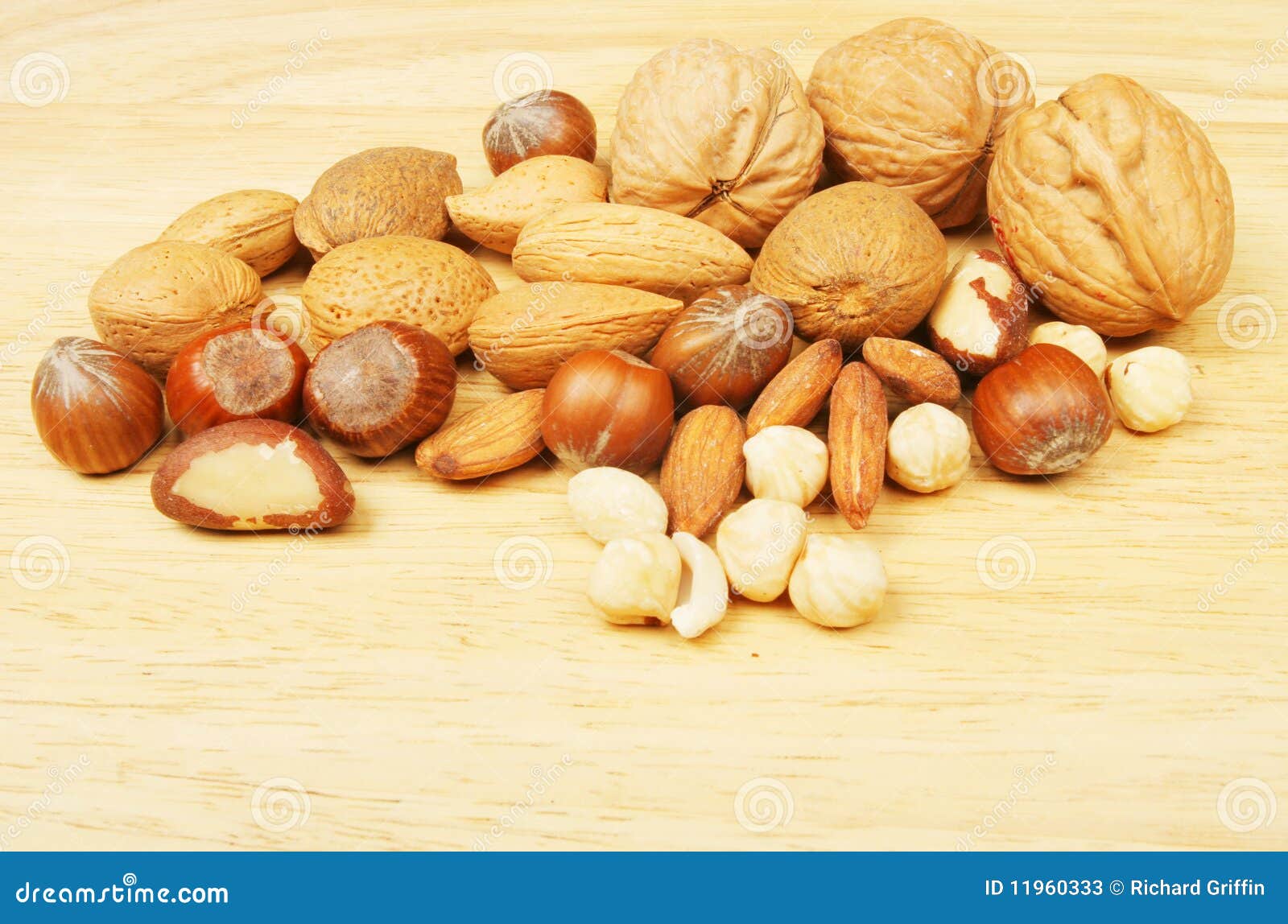 Whole and shelled nuts stock image. Image of snack, peanut - 11960333