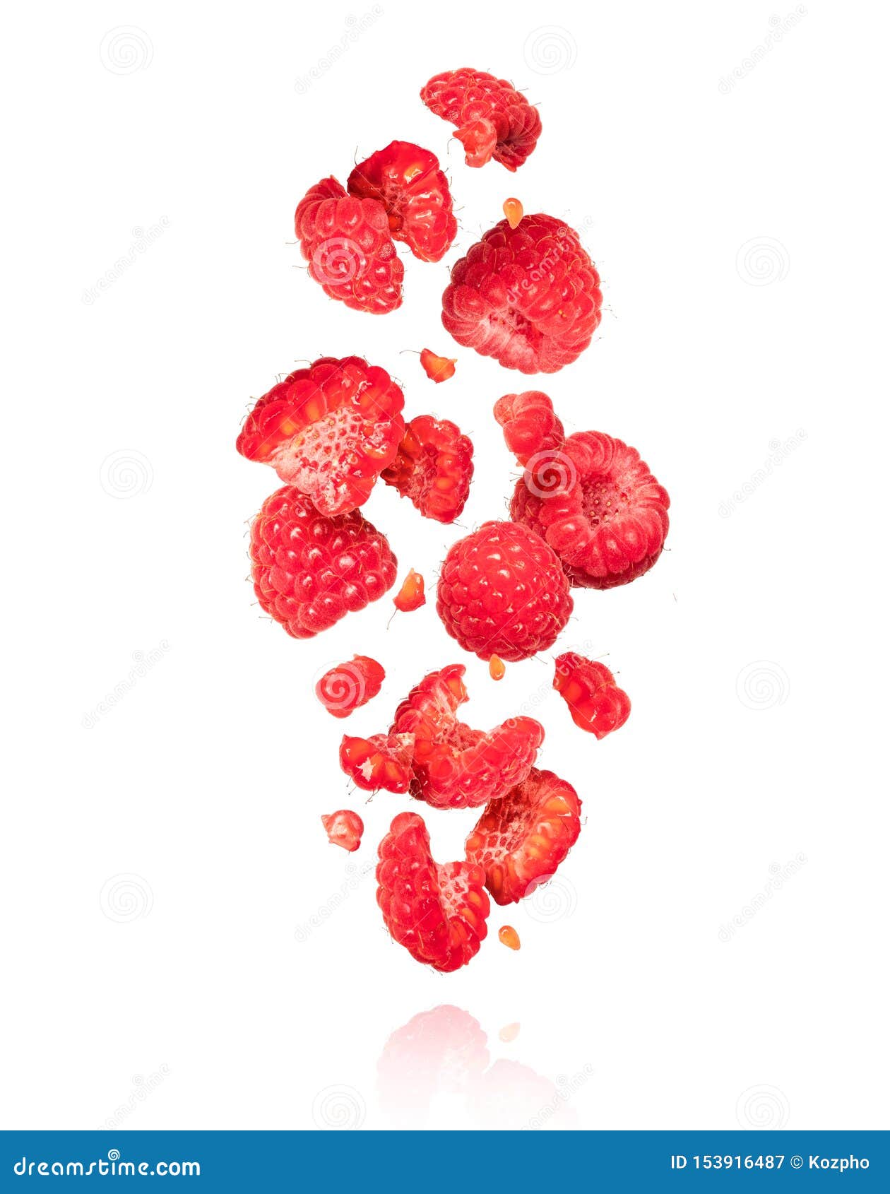 Whole and Sliced Raspberries in the Air Isolated on a White Background ...