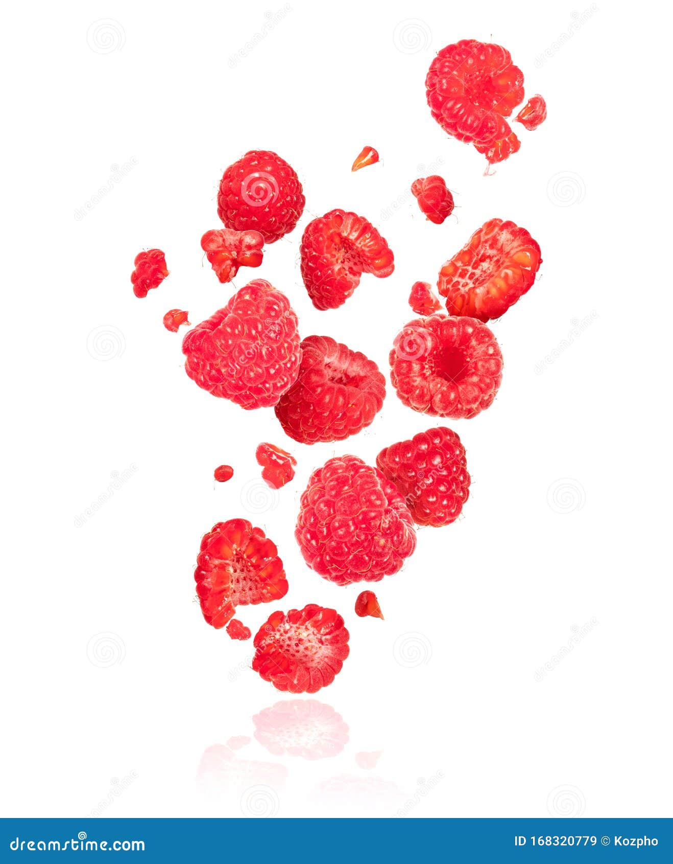 Whole and Sliced Raspberries in the Air on a White Background Stock ...