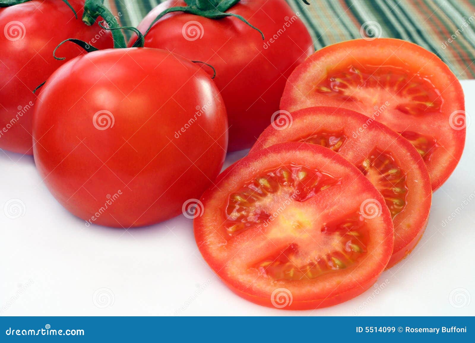 Whole And Sliced Tomatoes Royalty Free Stock Images - Image: 5514099