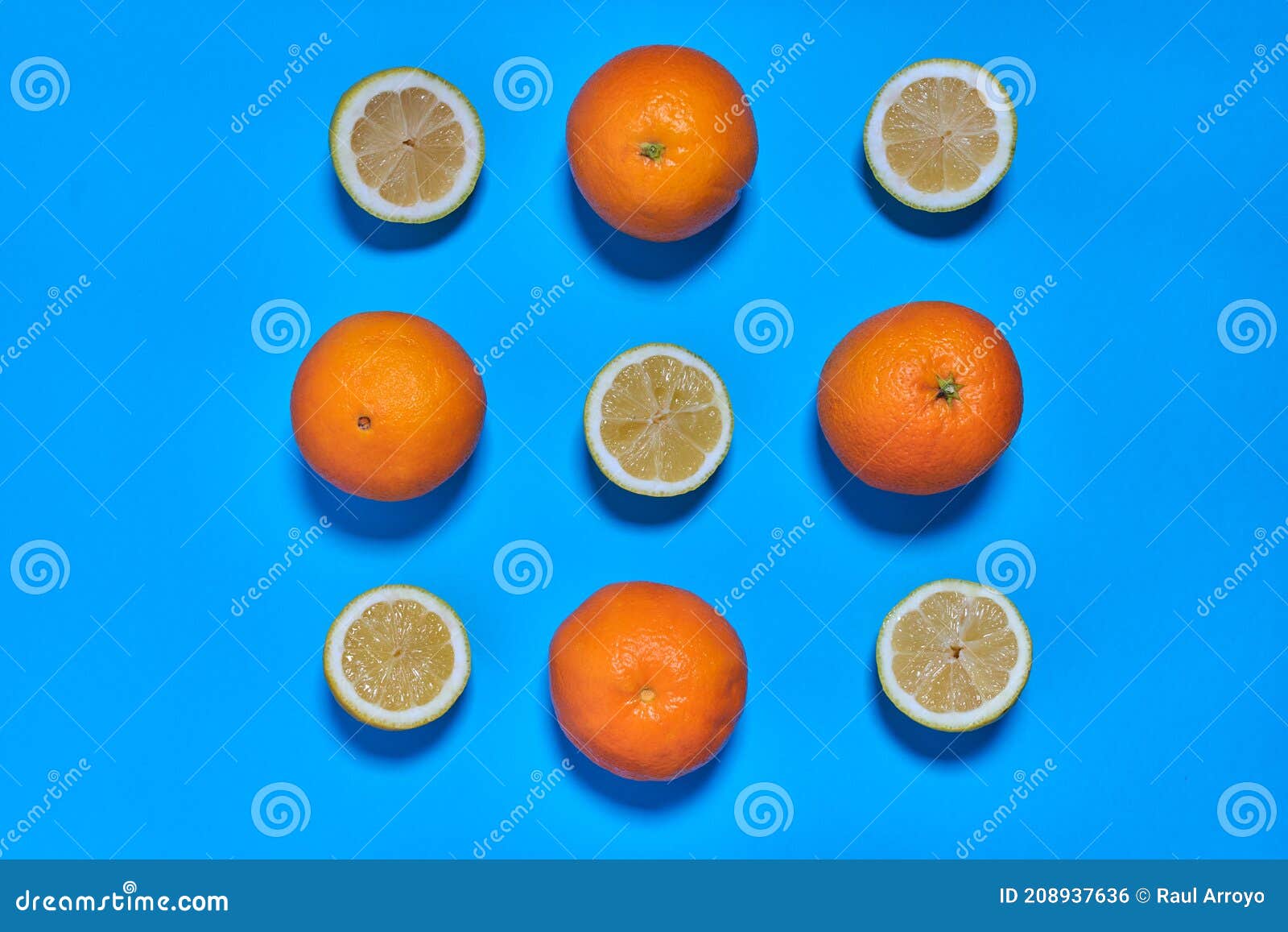 Whole and Split Oranges on a Blue Background. CITRUS CITRIC Stock Photo ...