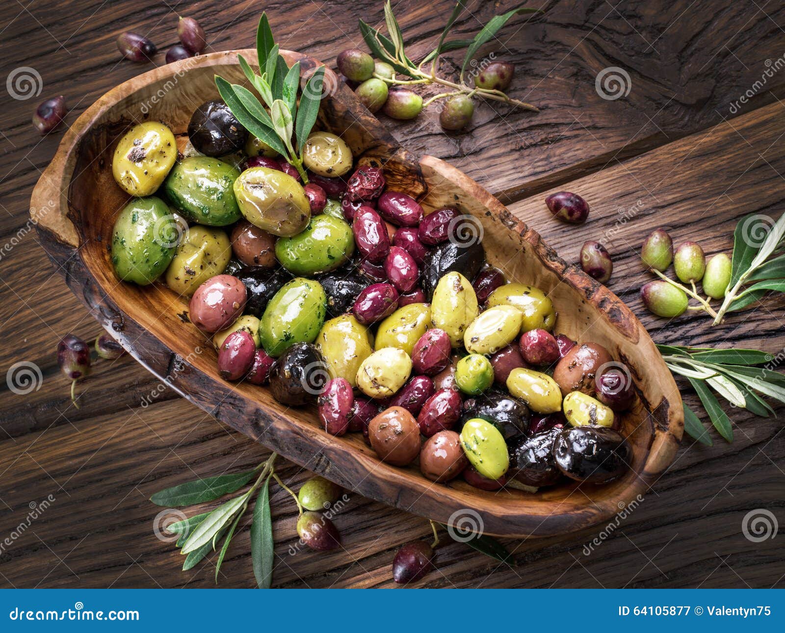 Whole Table Olives In The Wooden Bowl On The Table. Royalty-Free Stock ...