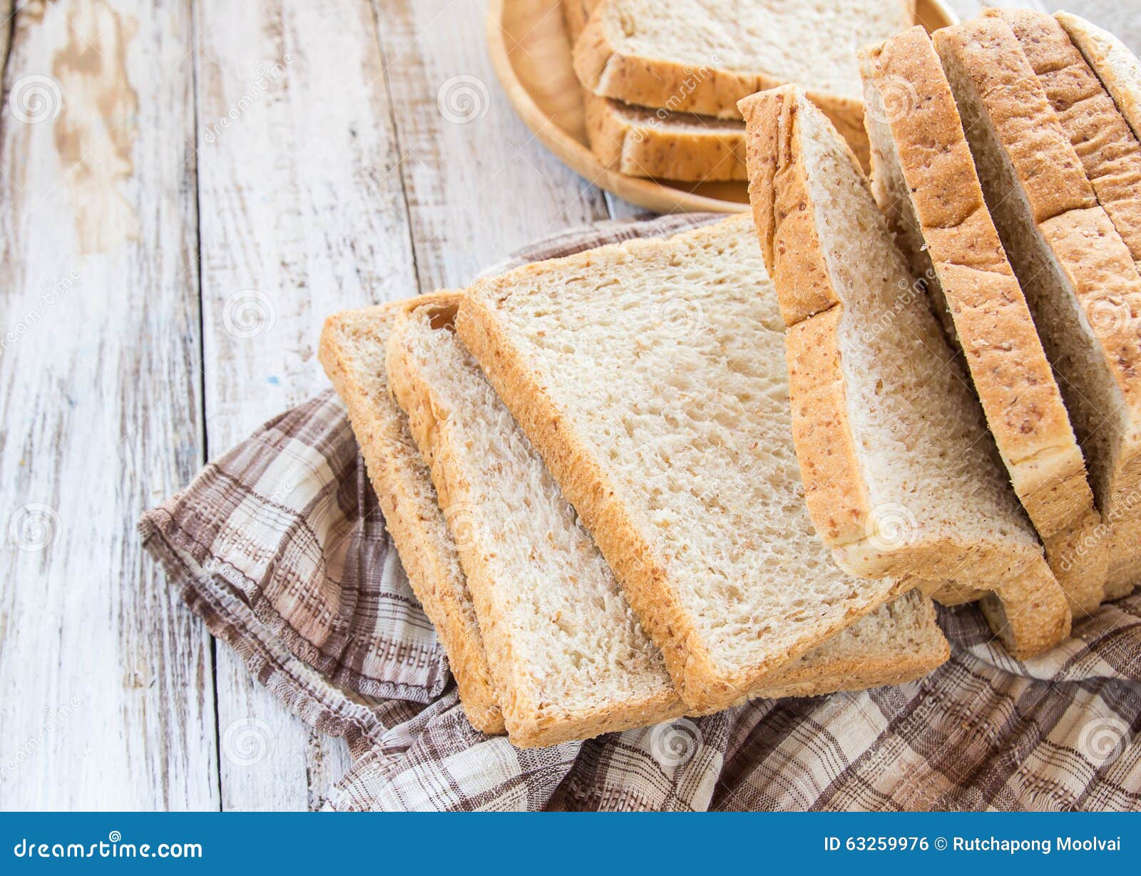 Whole Wheat Bread on Tablecloth Stock Photo - Image of bake, food: 63259976