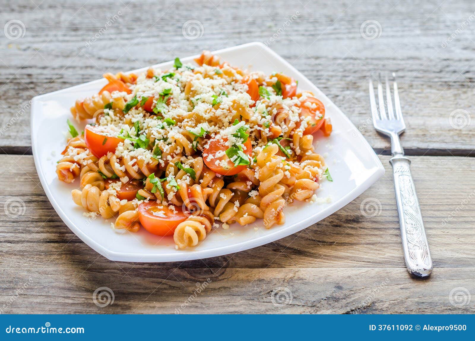 Whole wheat fusilli pasta stock photo. Image of lunch - 37611092