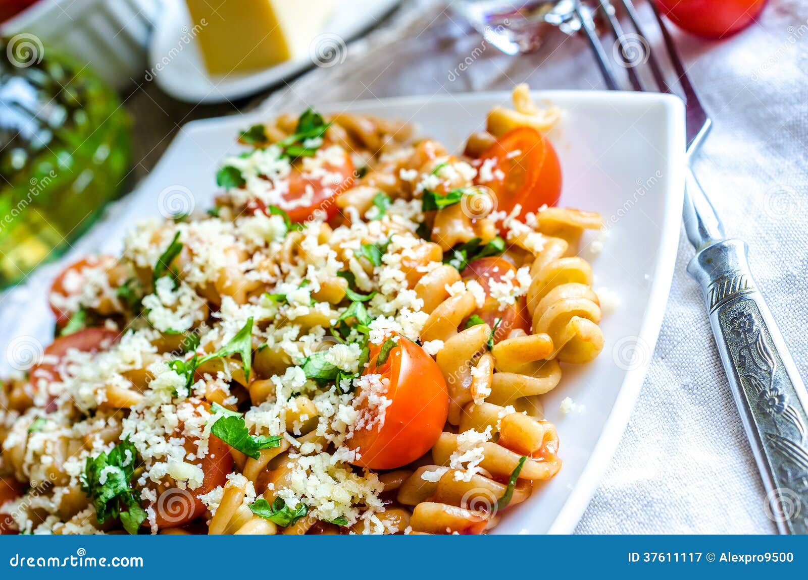 Whole Wheat Fusilli Pasta with Cheese and Cherry Tomatoes Stock Image ...
