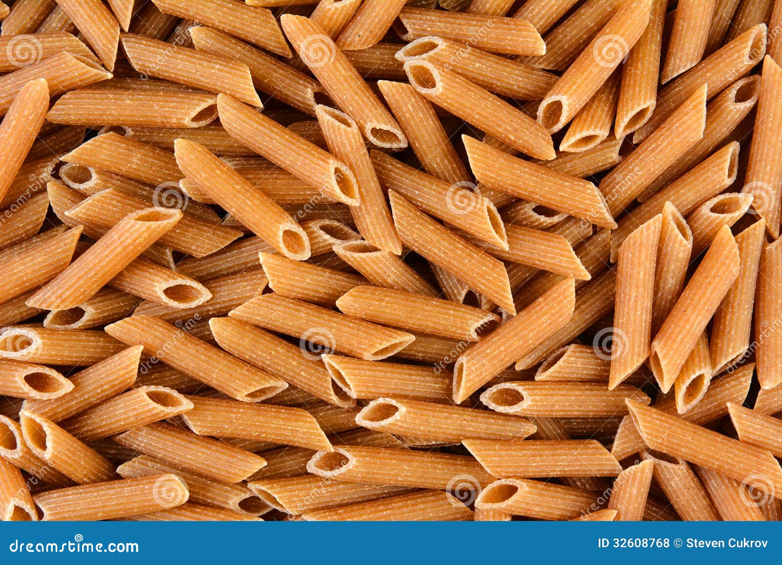 Whole Wheat Penne Rigate stock photo. Image of pantry - 32608768