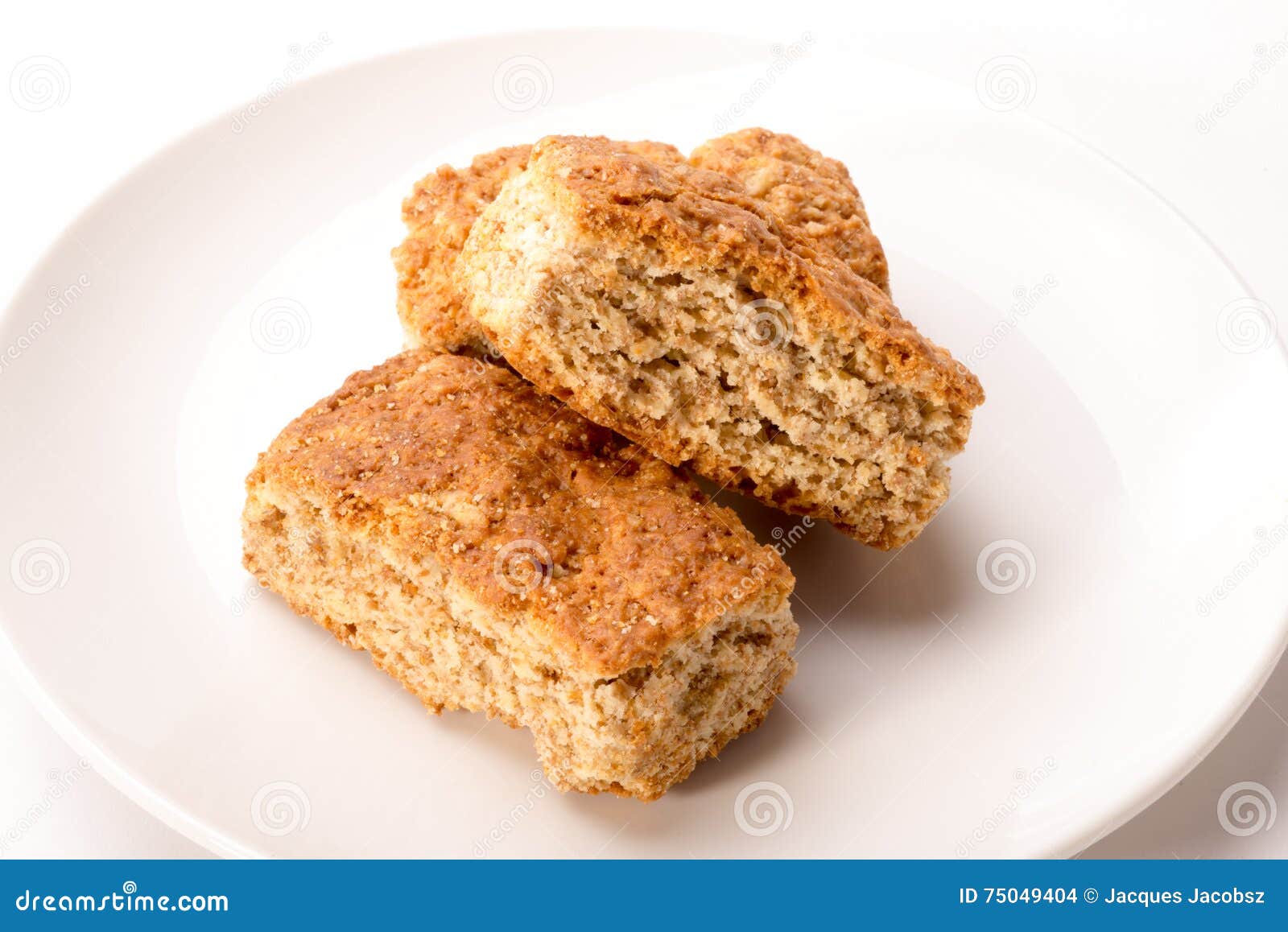 Whole wheat rusks on plate stock photo. Image of hunger - 75049404