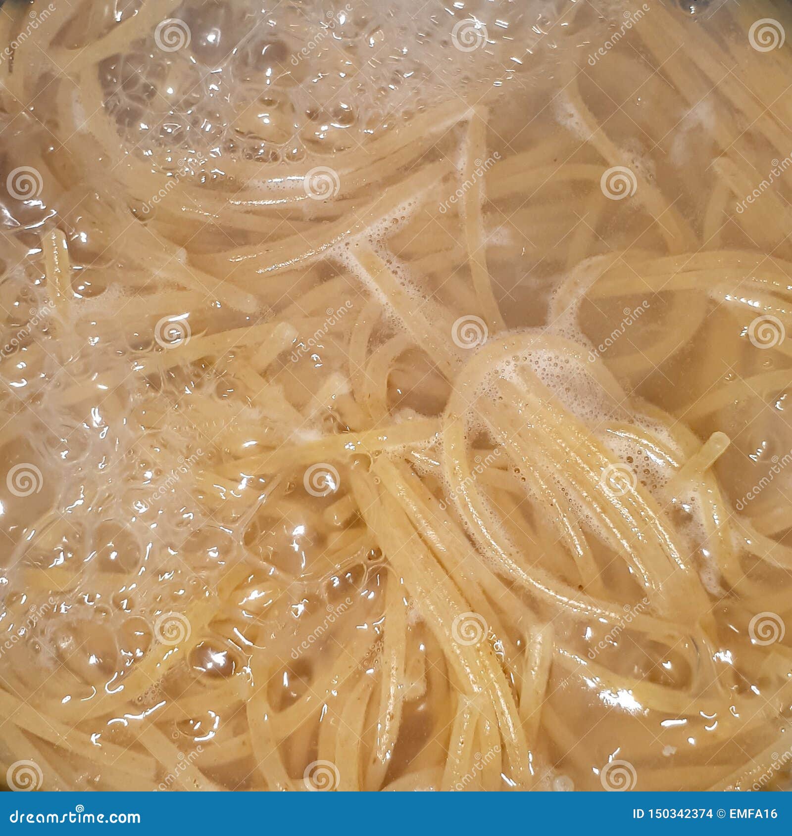 Whole Wheat Spaghetti Pasta Cooking in Water Stock Photo - Image of ...