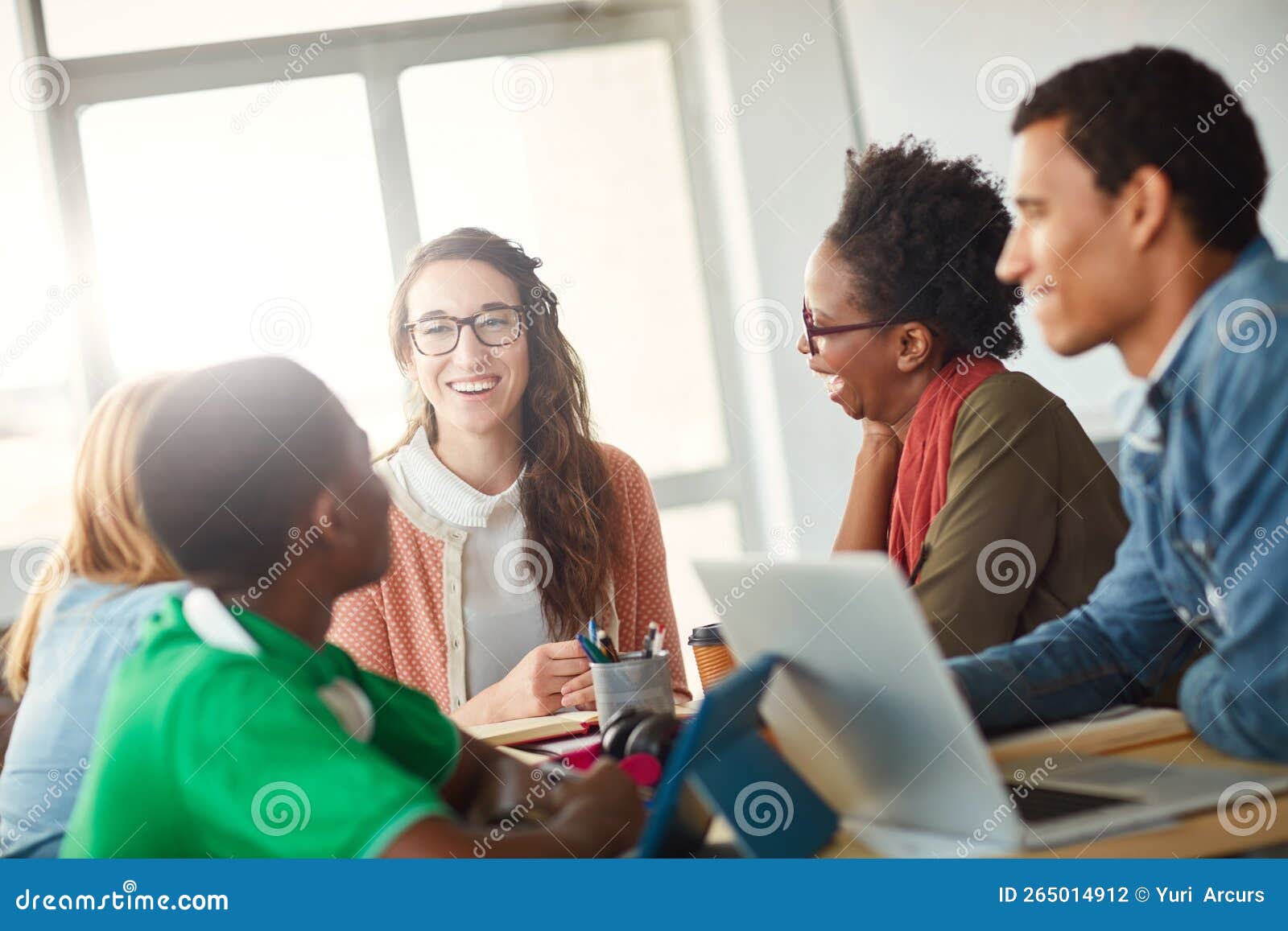 So Whos Doing What. a Group of University Students Working on a Group ...