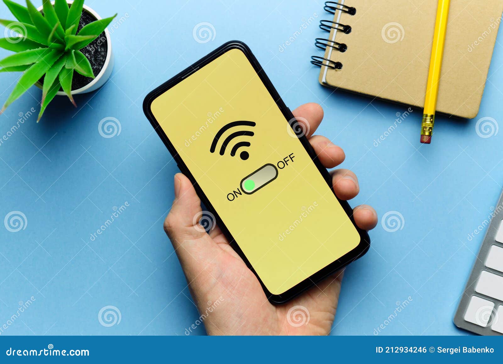 Wi-Fi Mode Enabled Concept with Smartphone in Person Hand Stock Photo ...