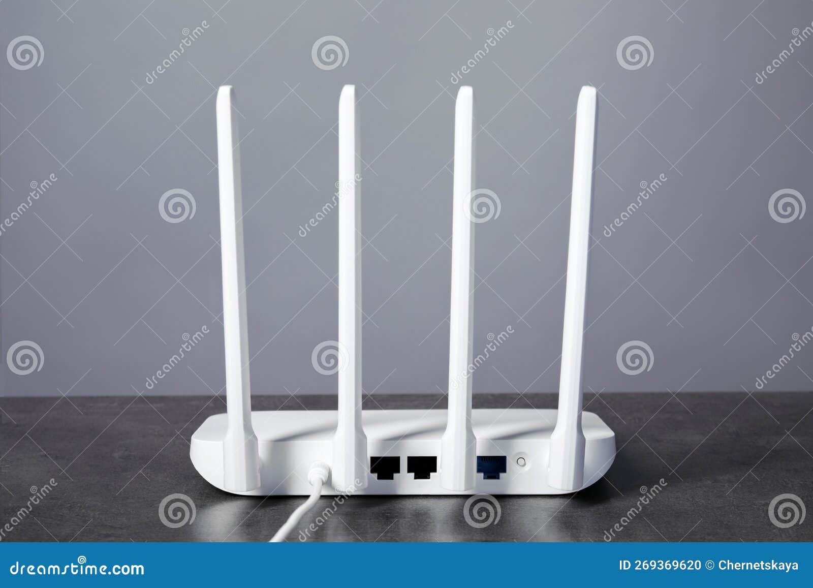 Wi-Fi Router on Grey Textured Table, Back View Stock Photo - Image of ...