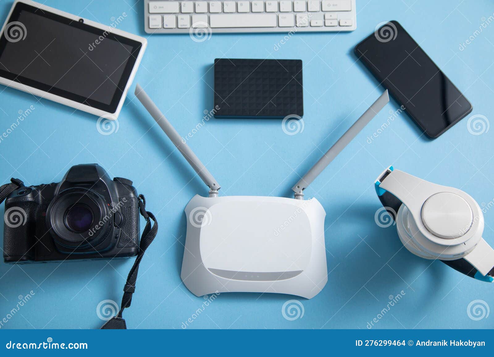Wi Fi Router with a Tablet, Phone, Computer Keyboard and Other Objects ...